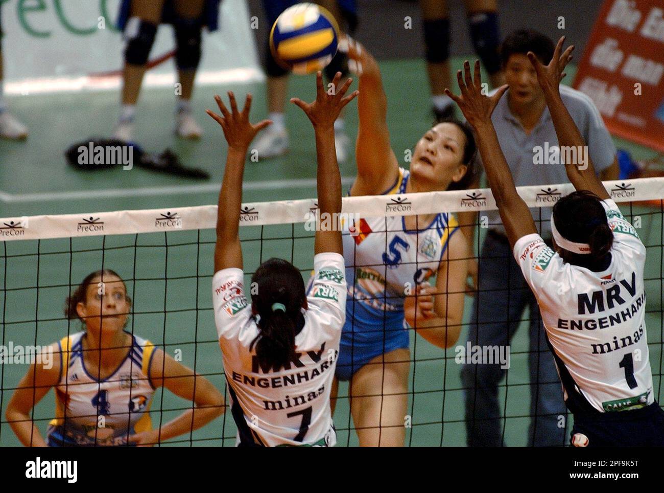Racing Club de Cannes, France, Player Erna Brinkman, left behind, observes teammate Ju-Lan Mao's ...