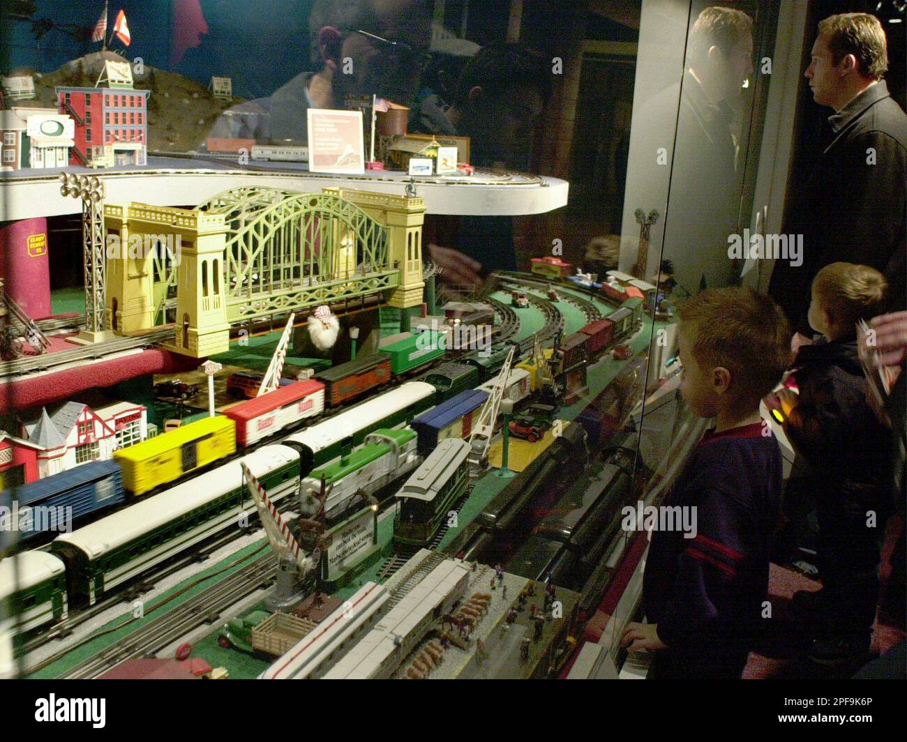Visitors look at the Glancy model train exhibit on Sunday, Dec. 29 ...