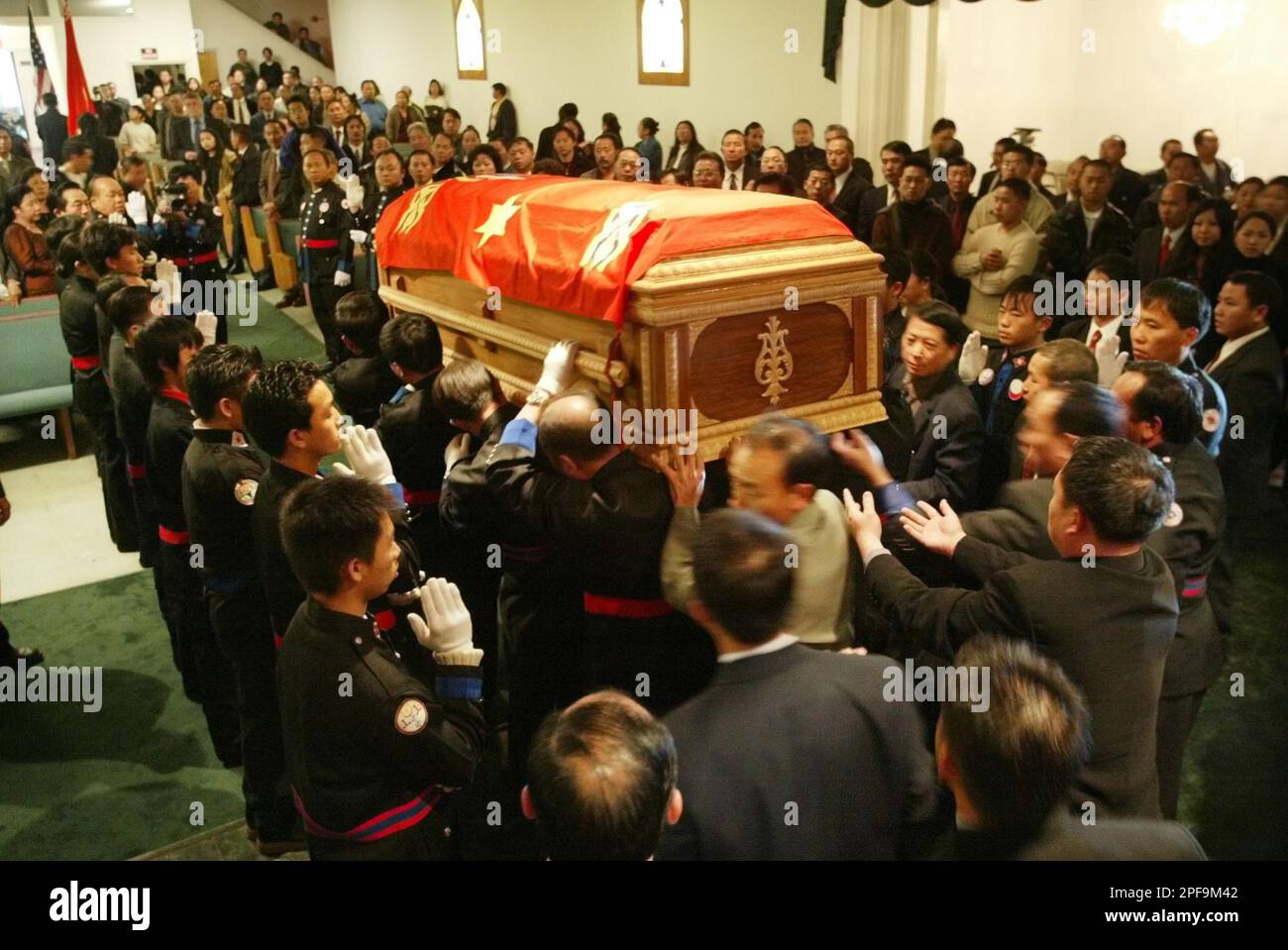 The casket of Pa Kao Her of the Democratic Chao Fa Party of Laos is ...