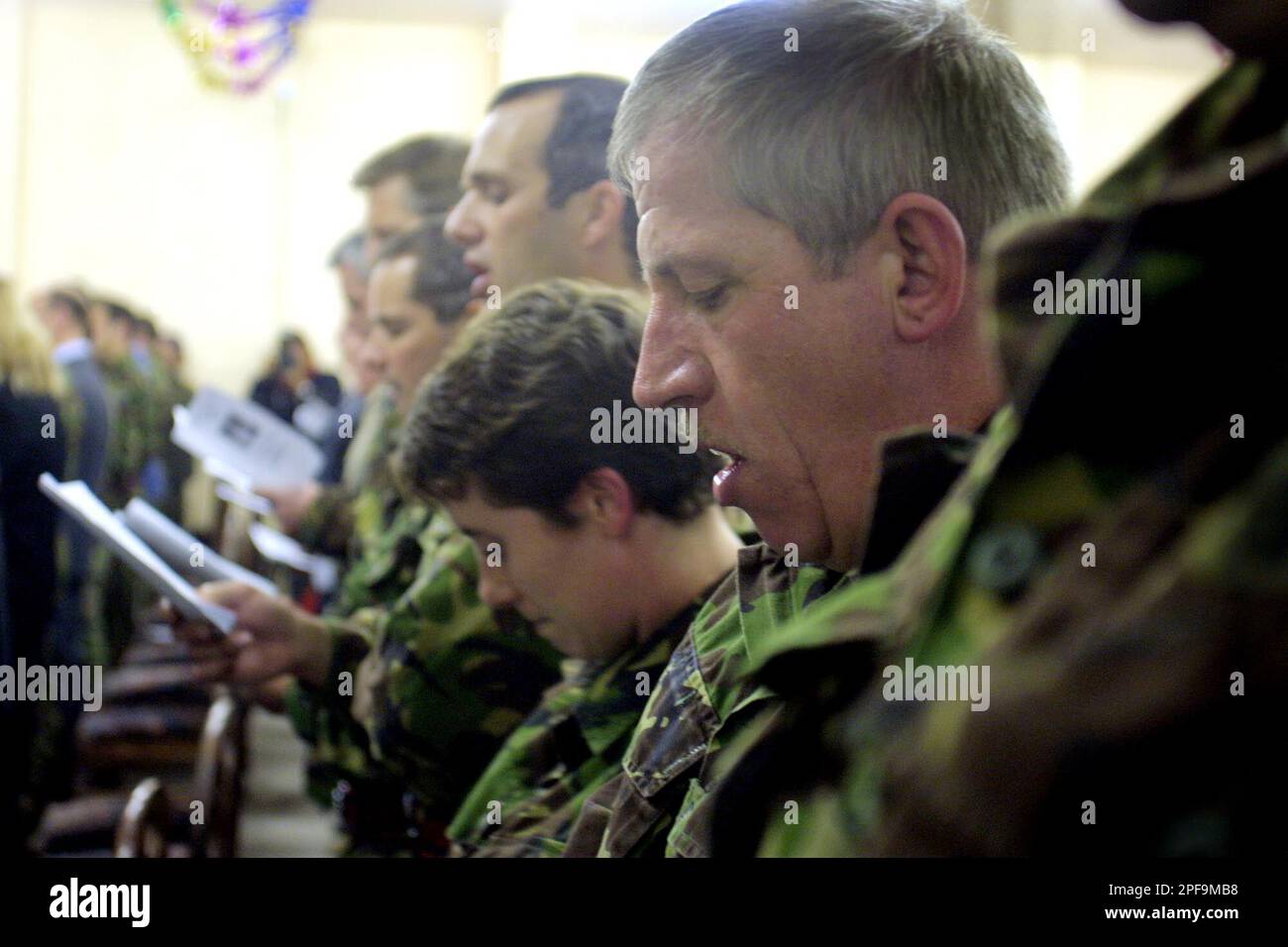 British soldiers sing Christmas carols during Christmas choral and ...