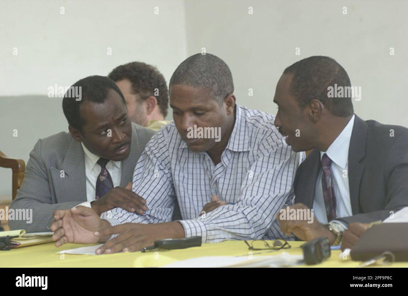 Three members of the Haitian opposition, from left to right, Osner ...