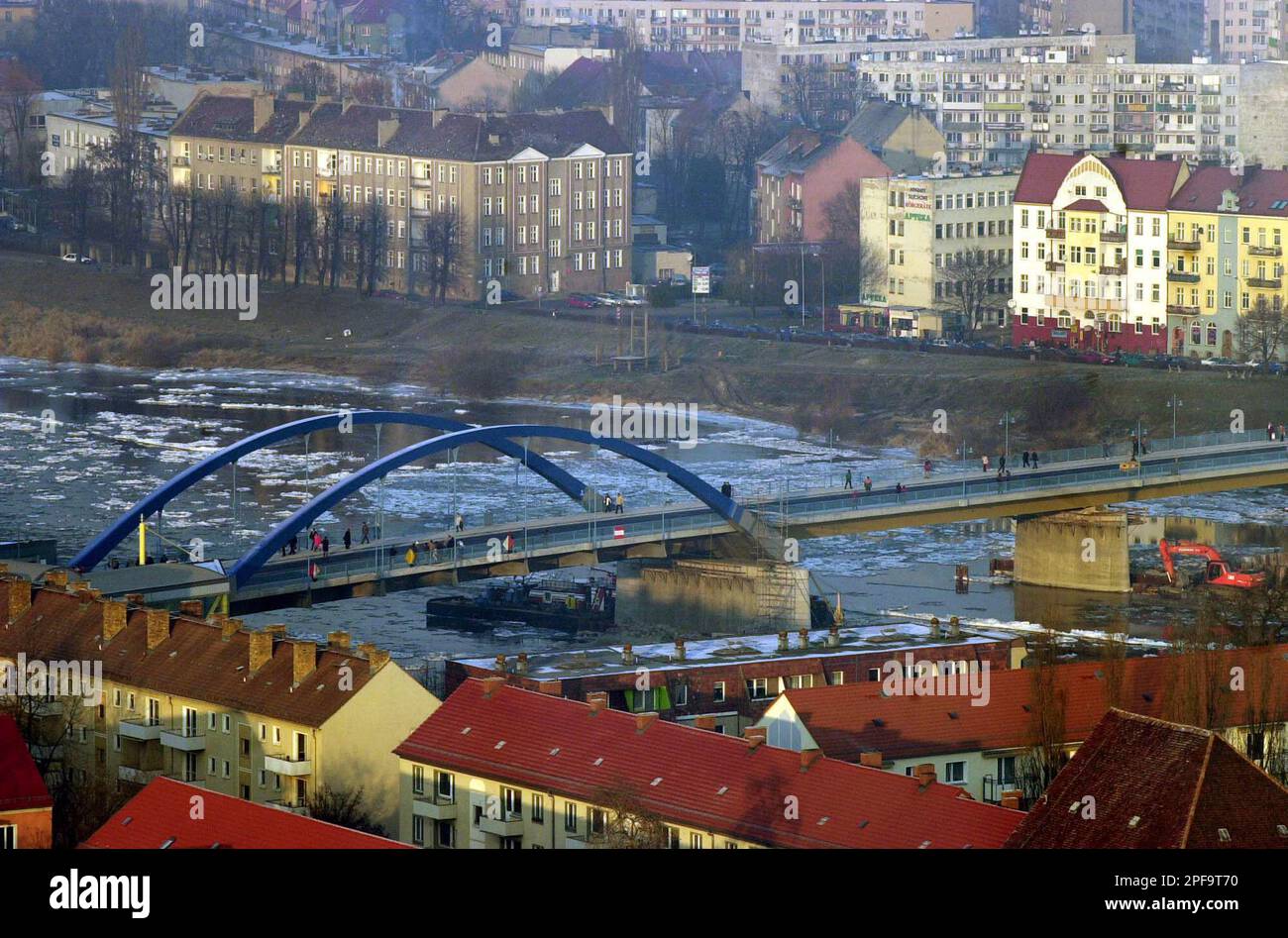 People cross the new City Bridge (Stadtbruecke) across the river Oder ...