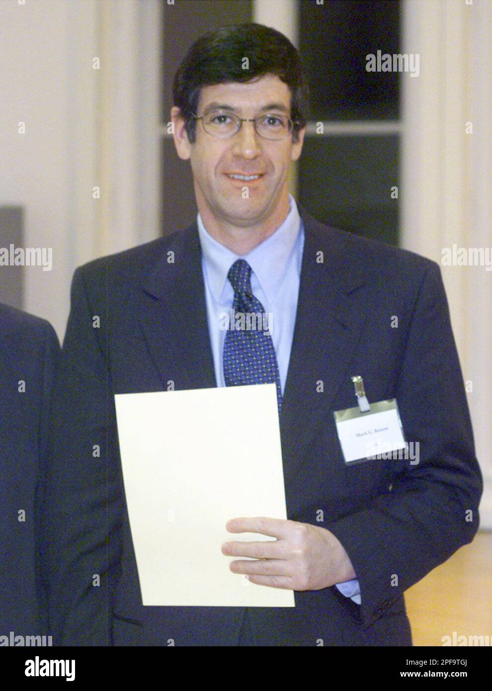 Mark G. Raizen of the University of Texas at Austin, USA, receives one ...