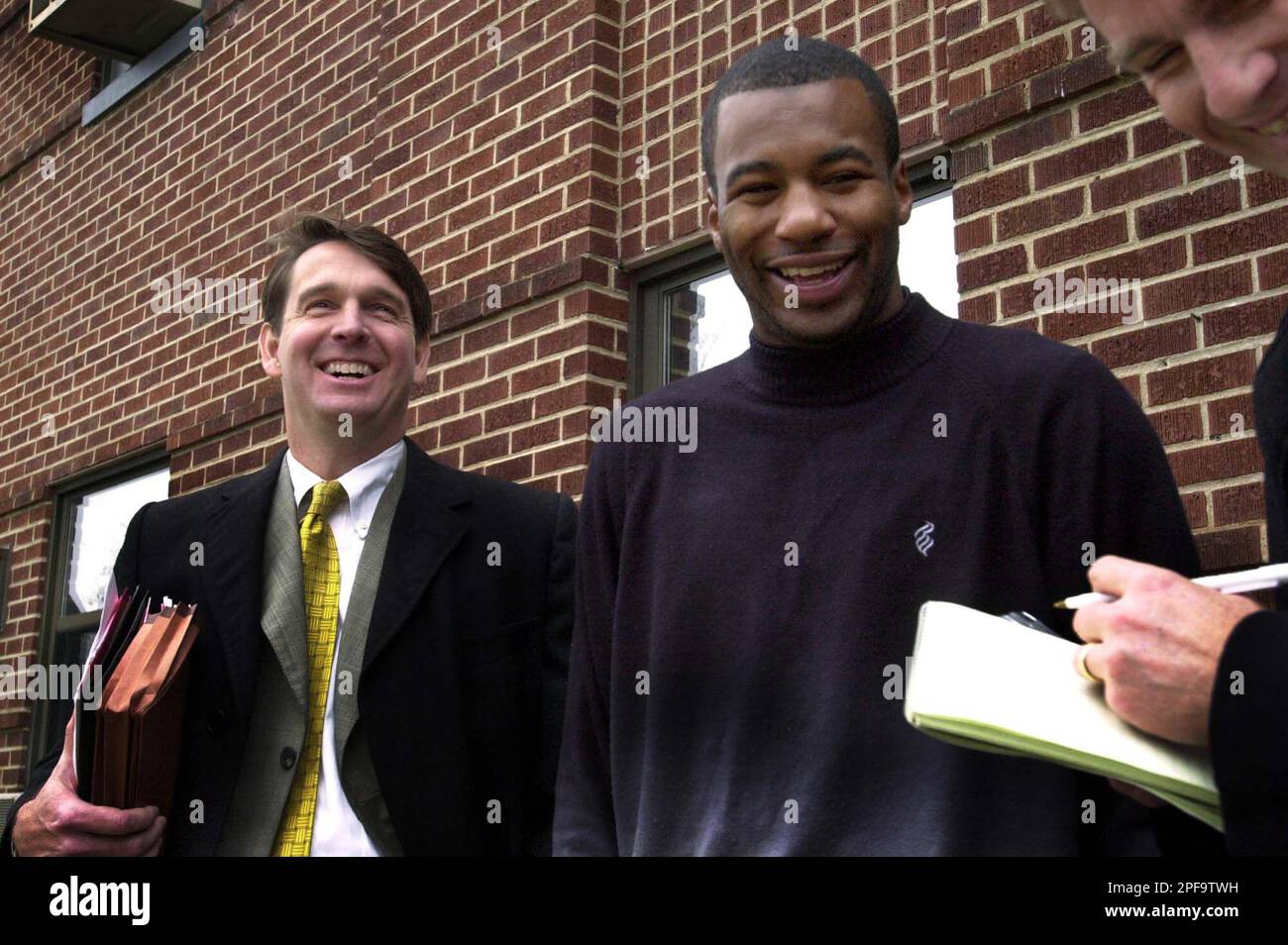 South Carolina State running back, Derek Watson, center, smiles with ...