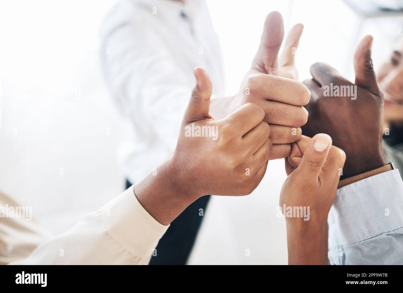 Hands, thumbs up or business people in agreement, support or ...