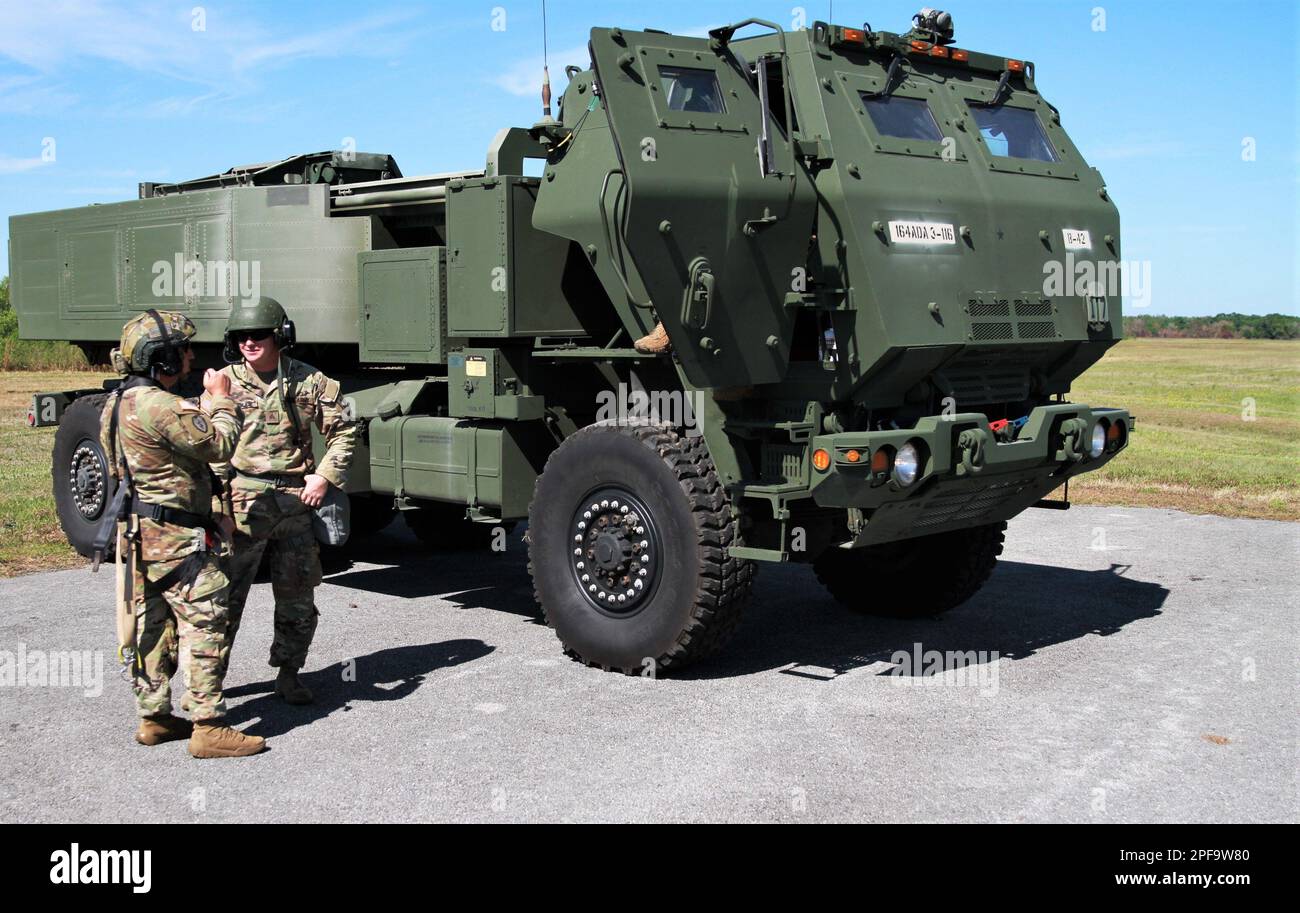 Soldiers with 3-116th Field Artillery (FA) Battalion discuss plans by ...