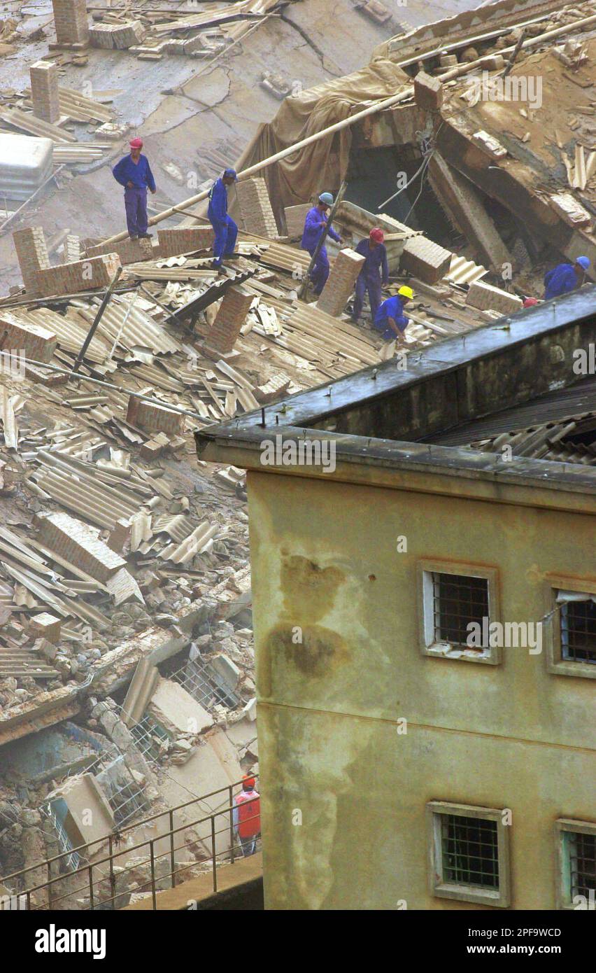 A demolition crew examines debris from the Carandiru Penitentiary as in ...