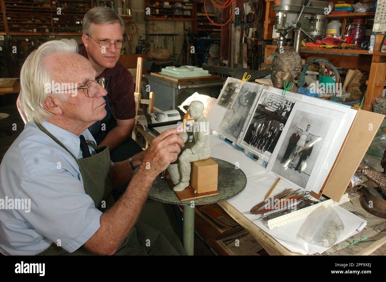 Lawrence, Kan., sculpter Eldon Tefft, left, with his son Kim Tefft ...