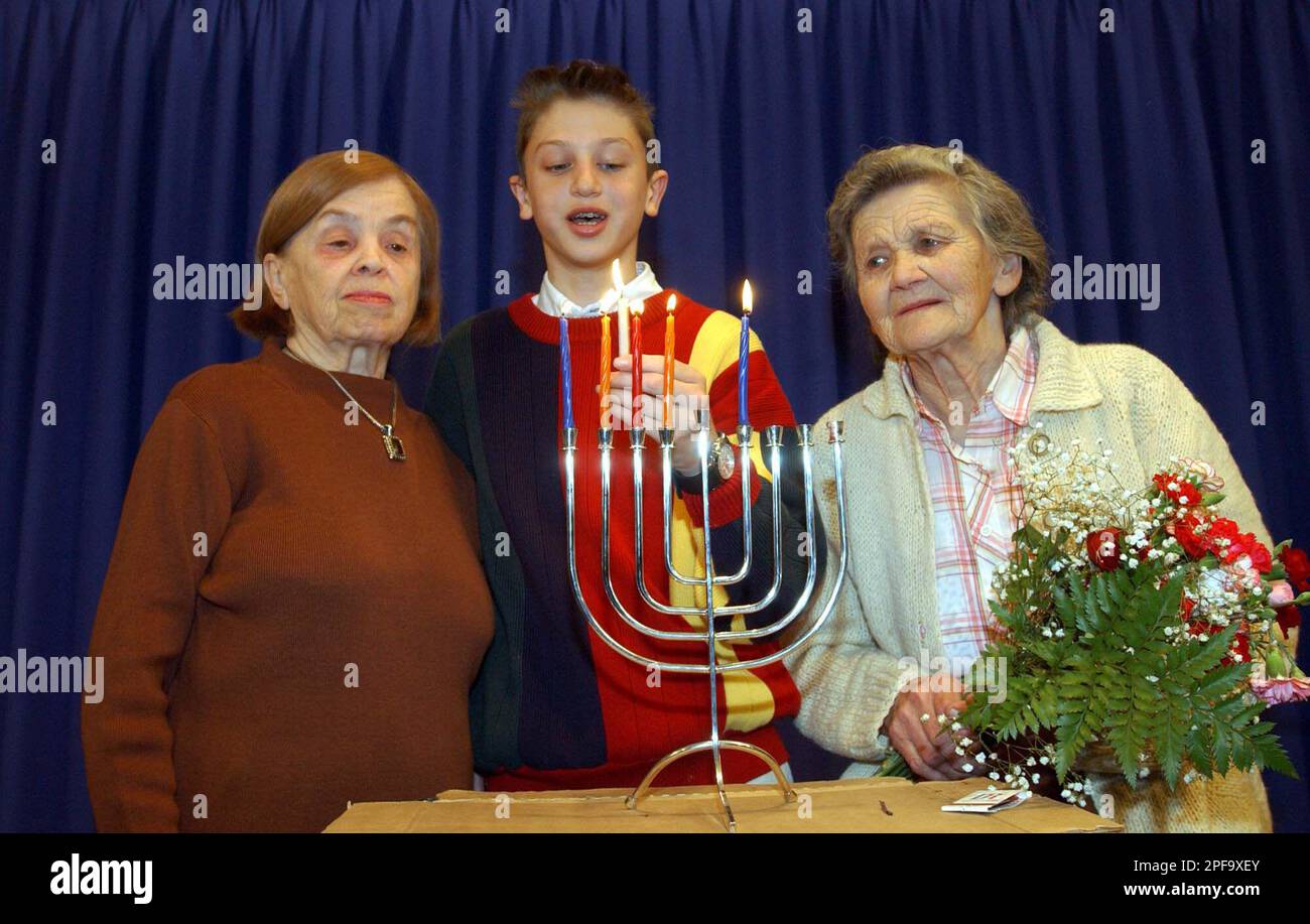 Anna Kopec, right and Sally Charinsky, left, watch as Sally's grandson ...