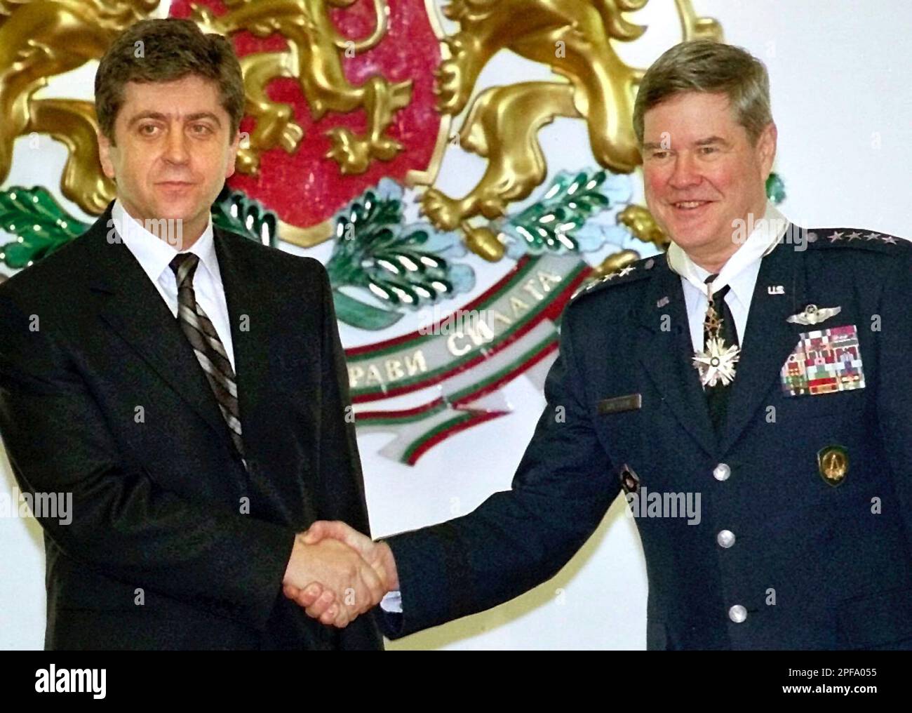 U.S. Gen. Joseph Ralston, NATO Supreme Allied Commander Europe, right ...