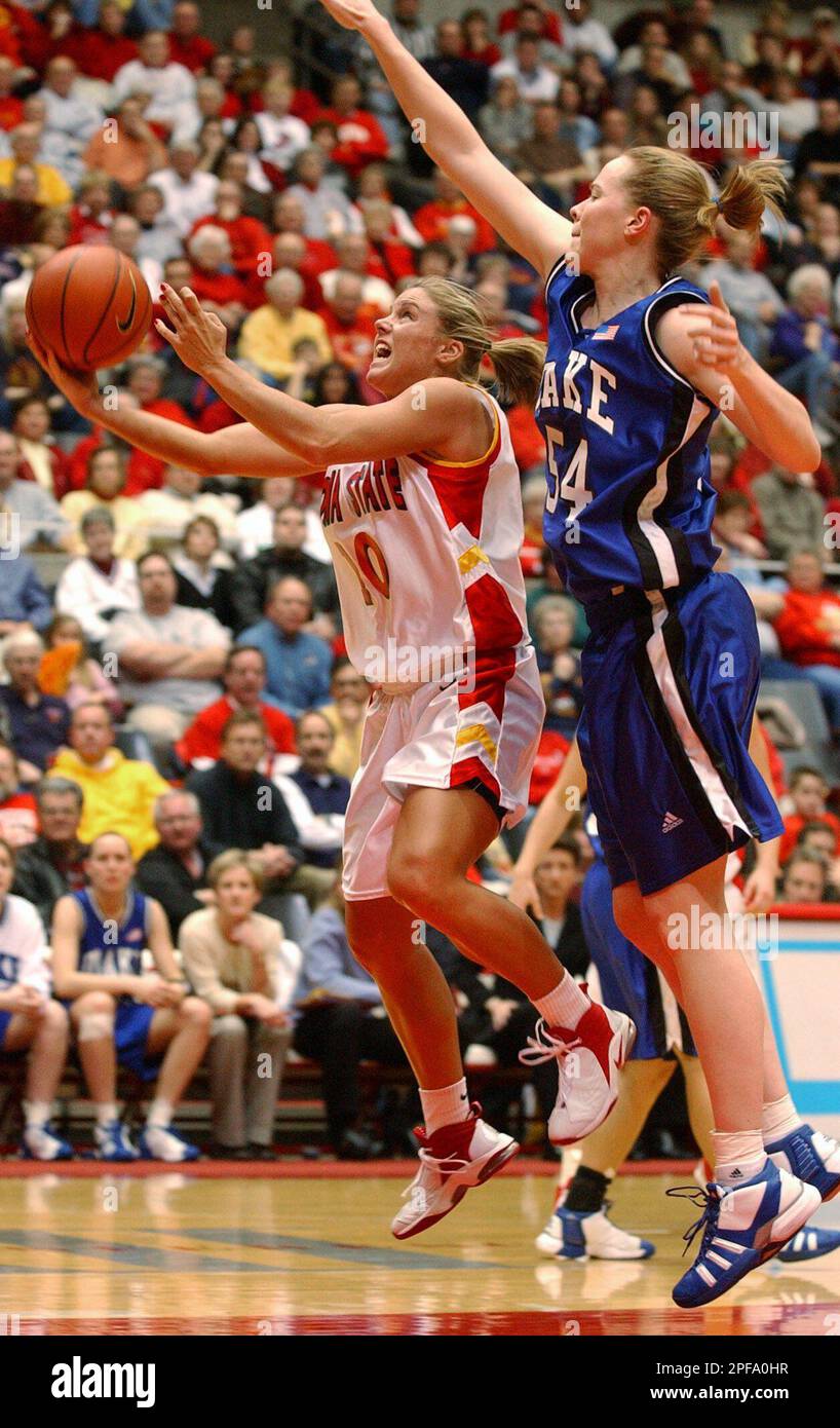 Iowa State's Erica Junod, left, drives to the basket past Drake's Carla ...