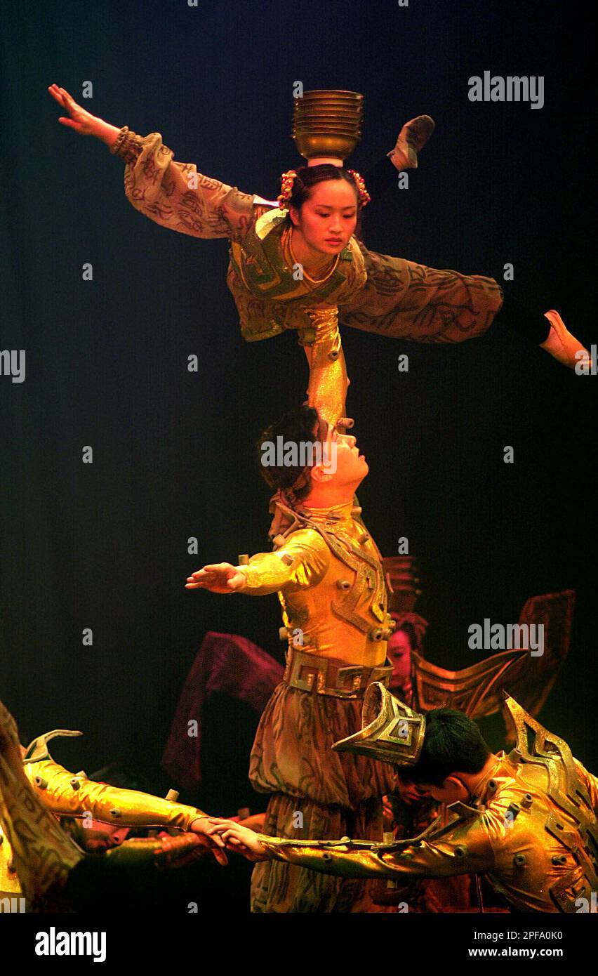 Acrobats of the "Big Chinese State Circus" balance during a rehearsal in Rostock, northern ...