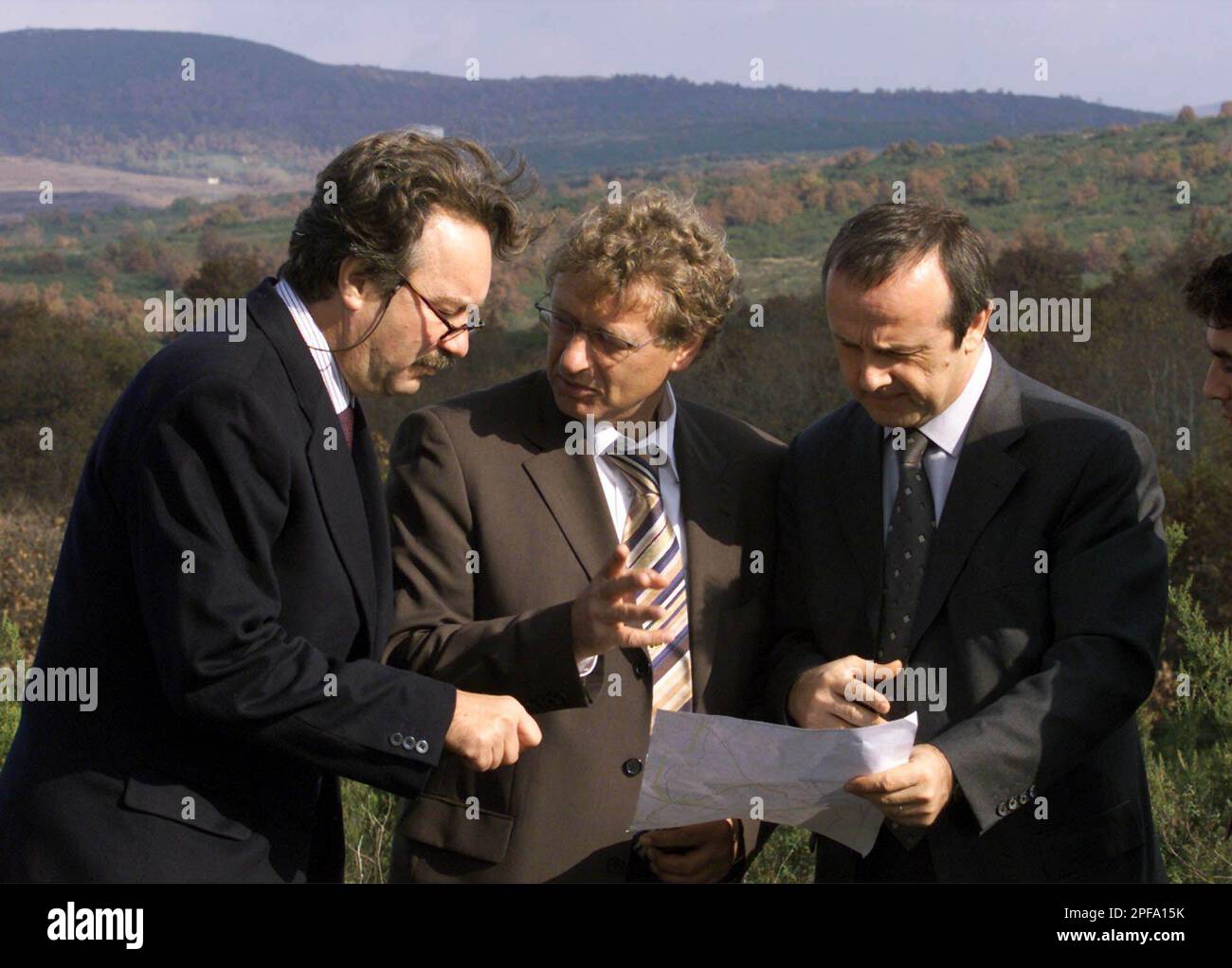 German architect Hermann Tilke, center, Mumtaz Tahincioglu, the head of ...