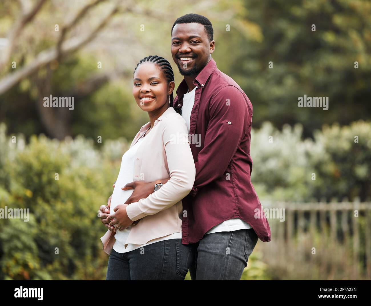 Time for a brand new start. a young expecting couple posing together in ...