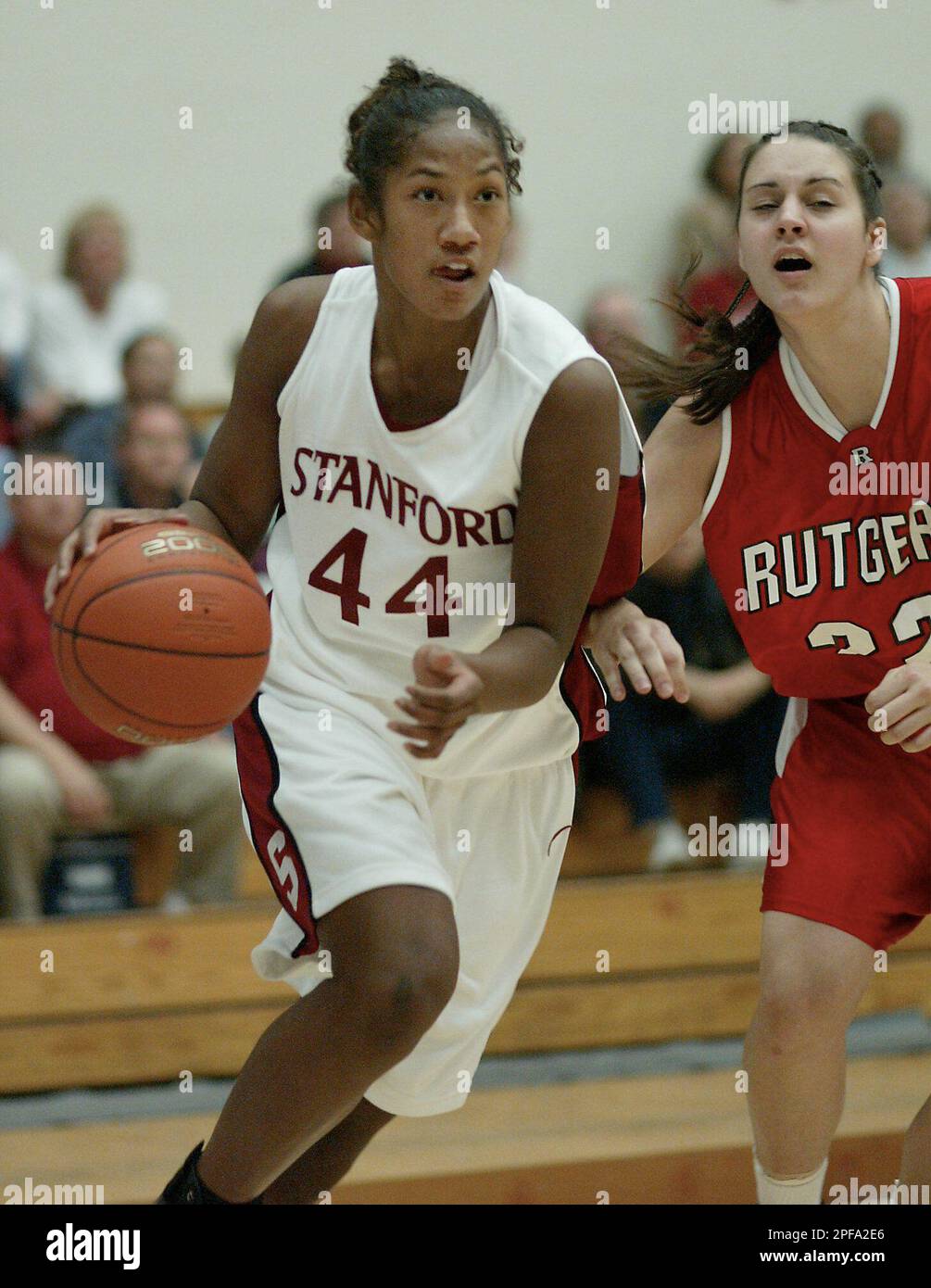 Stanford's Azella Perryman (44) dribbles past Rutgers' Amber Petillon ...