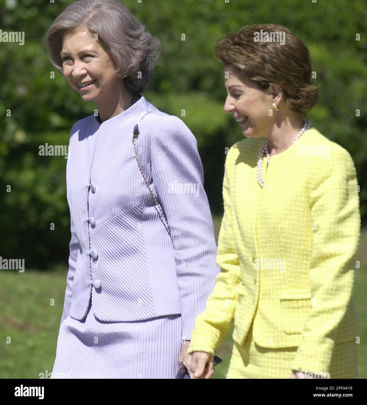 Queen Sofia of Spain, right, and Mexican first lady Martha Sahagun take ...