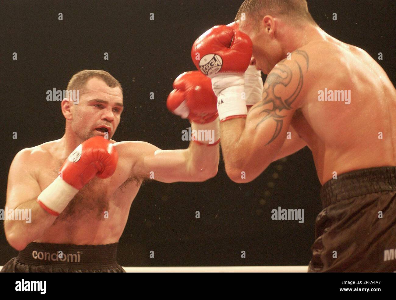 German boxer Sven Ottke, left, punches Rudy Markussen from Denmark as ...