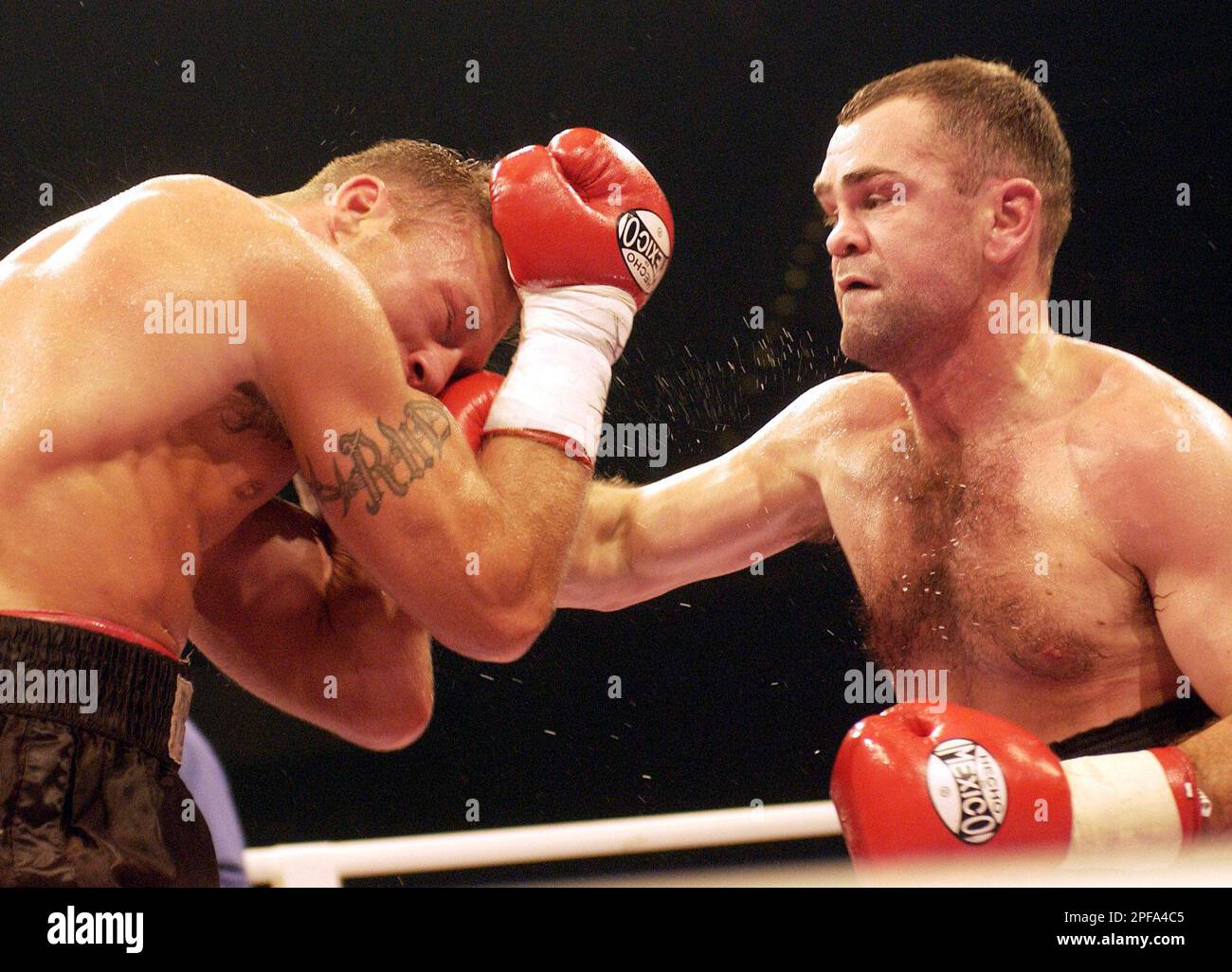 German boxer Sven Ottke, right, punches Rudy Markussen from Denmark as ...
