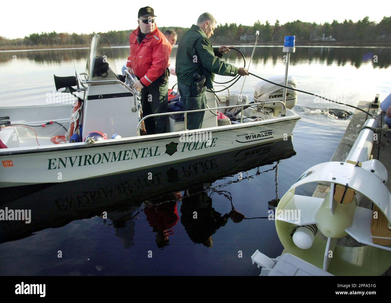 Mass. environmental police officers Bruce Parziale, left, and David ...