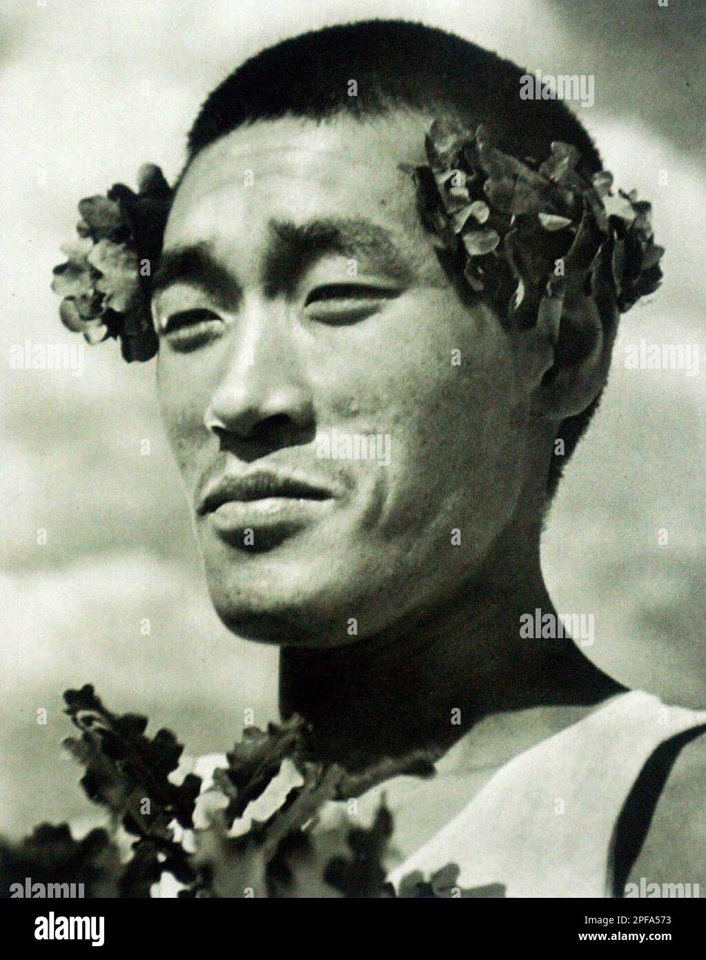 Sohn Kee-chung, a Korean marathoner is seen in this 1936 photo as he is ...