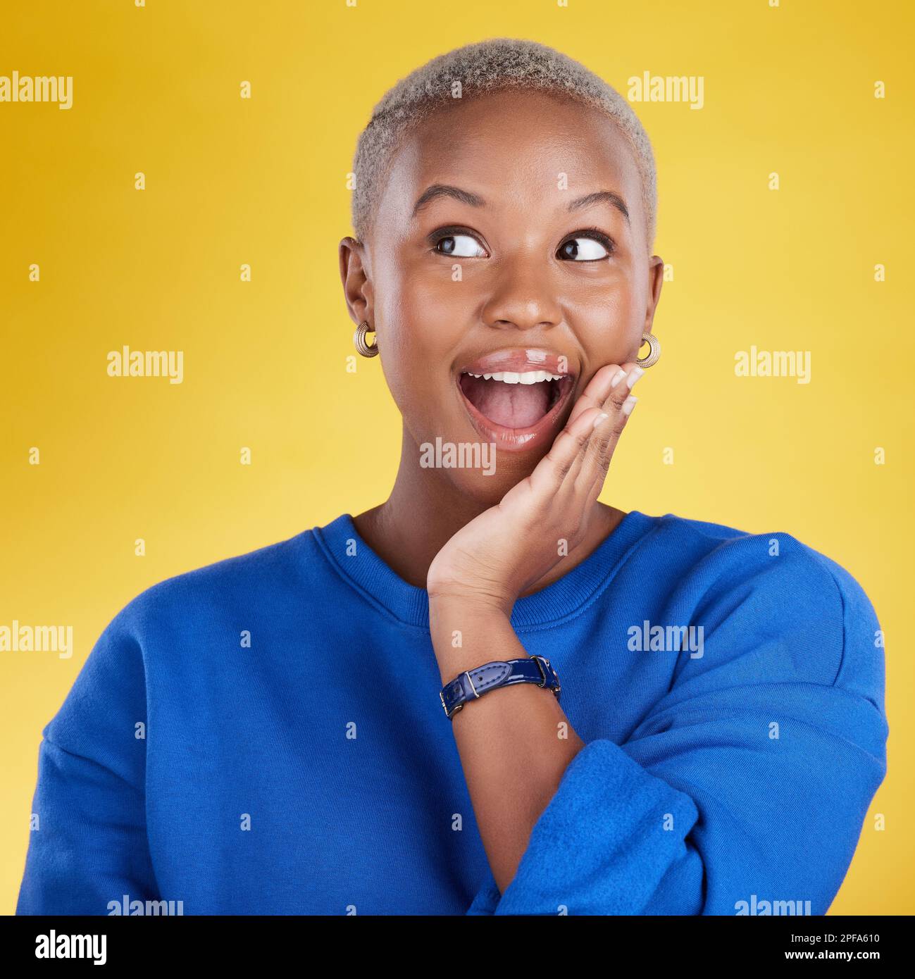 Wow, thinking and eureka with a black woman in studio on a yellow ...
