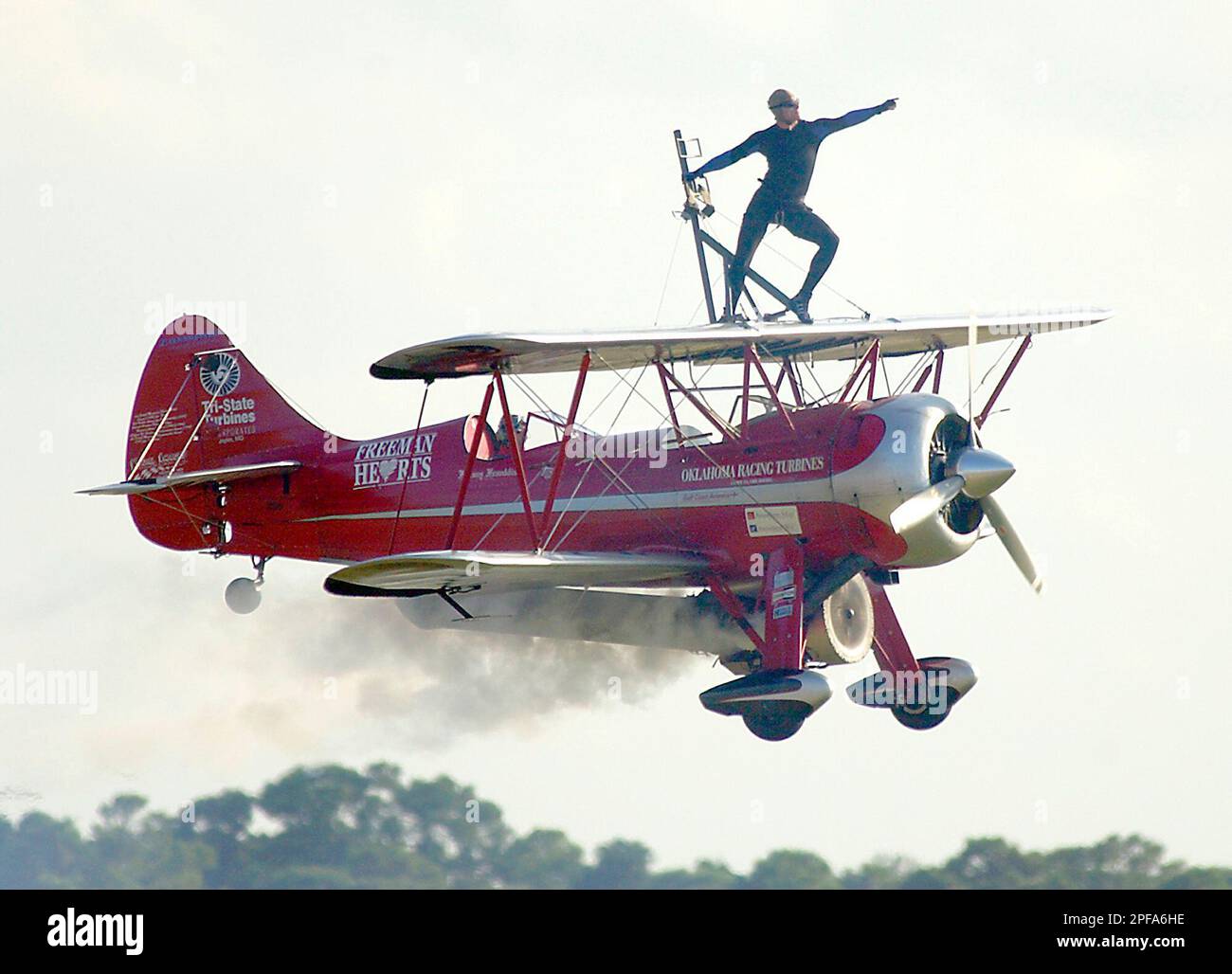 Kyle Franklin performs the "Hood Ornament" maneuver as he walks atop of ...
