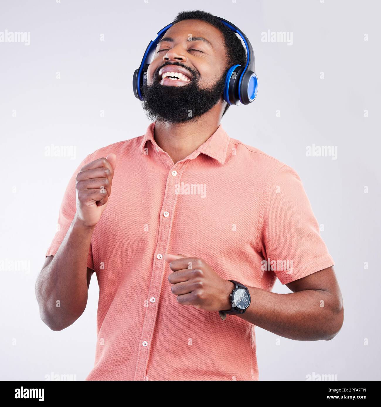 Music headphones, dance and happy black man streaming song for studio ...