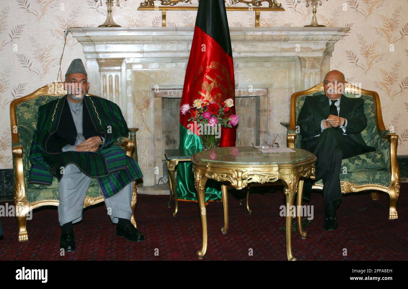 Afghanistan's President Hamid Karzai, left, and Afghanistan's former ...