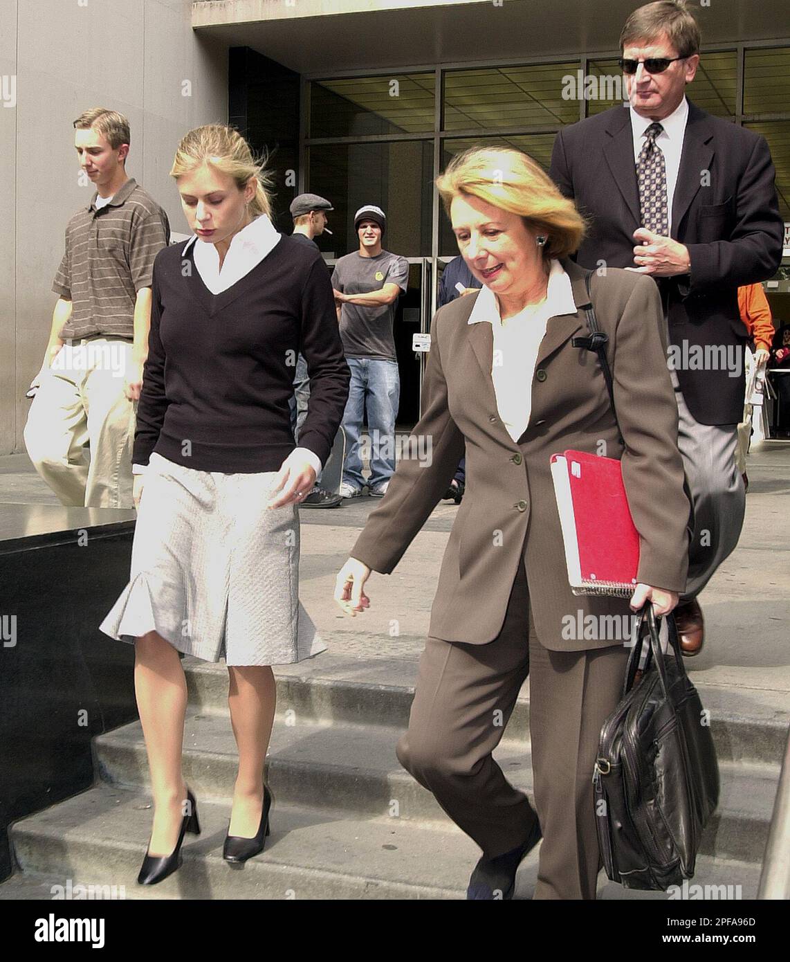Kristin Rossum, second from left, a former San Diego County ...