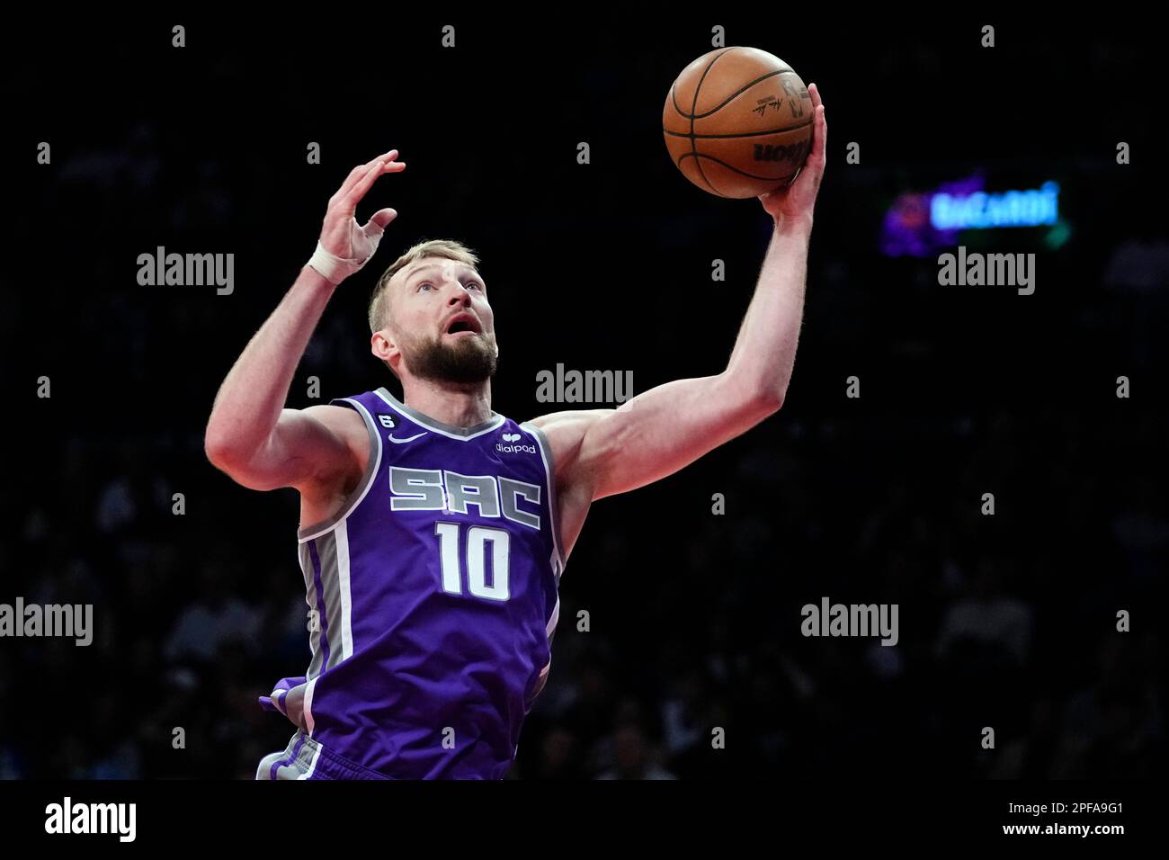 Sacramento Kings' Domantas Sabonis drives to the basket during the first half of the team's NBA ...