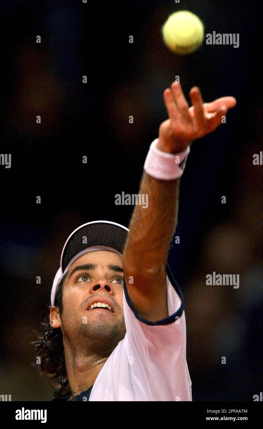 Chile's Fernando Gonzales returns a ball to Argentina's David ...