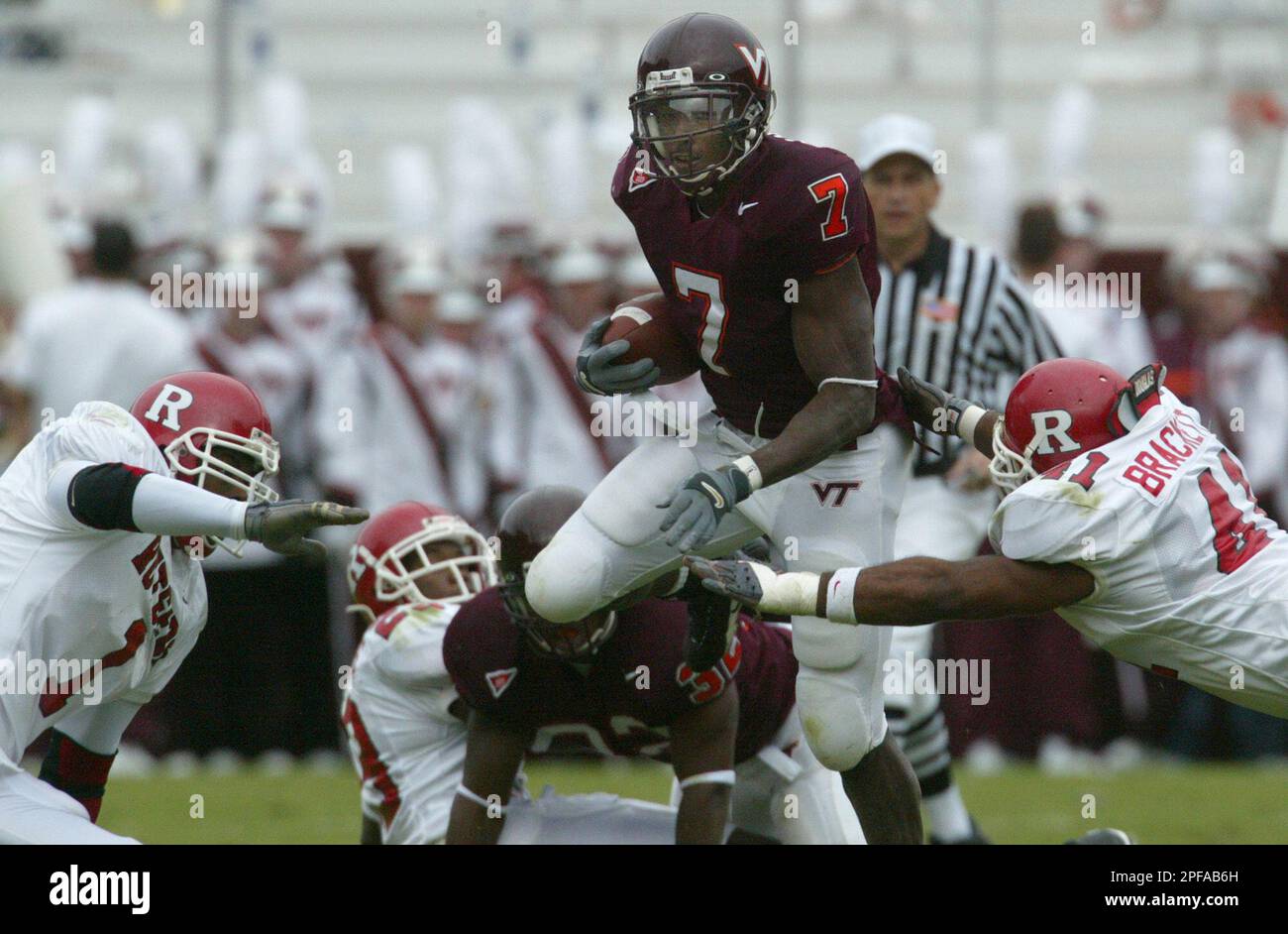 Virginia Tech running back Kevin Jones (7) avoids the tackle of Rutgers ...