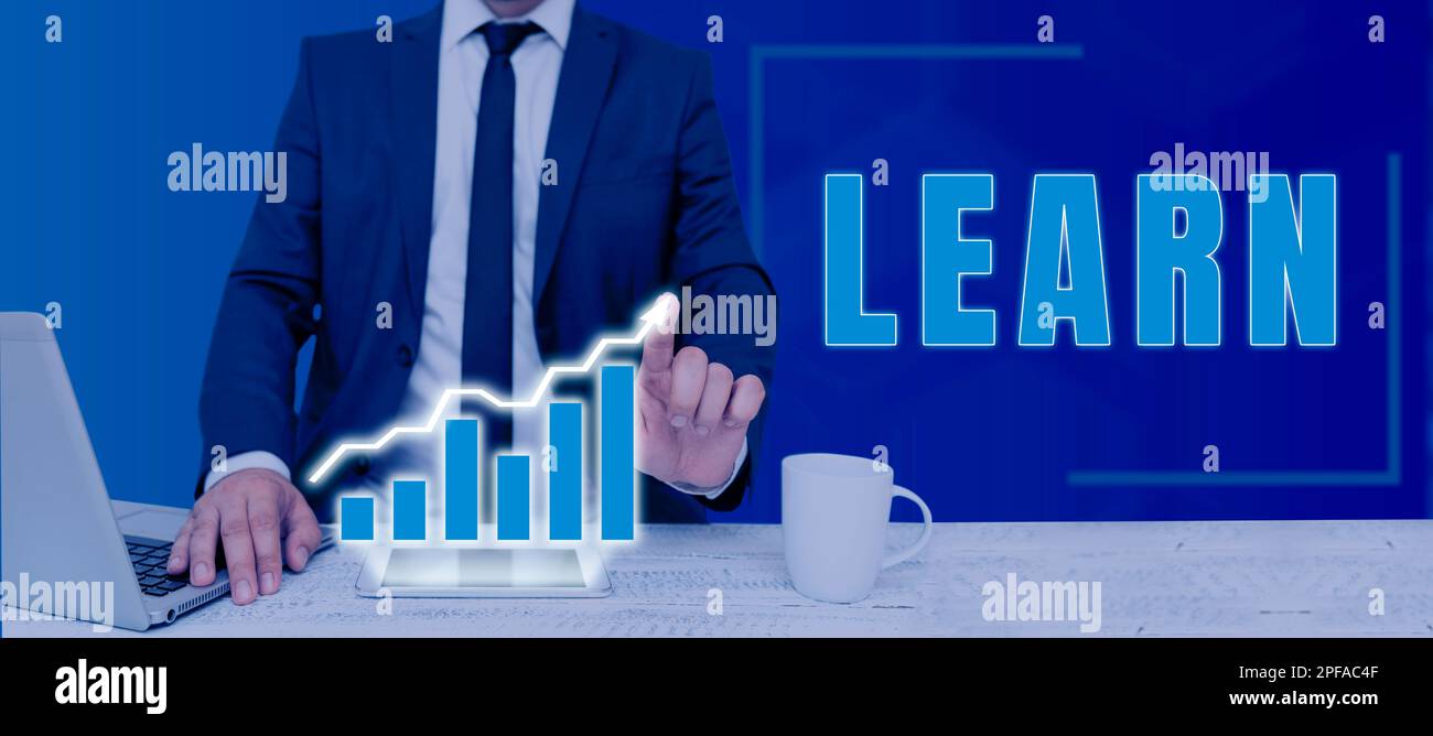 Hand writing sign Learn. Concept meaning acquire knowledge of or skill ...