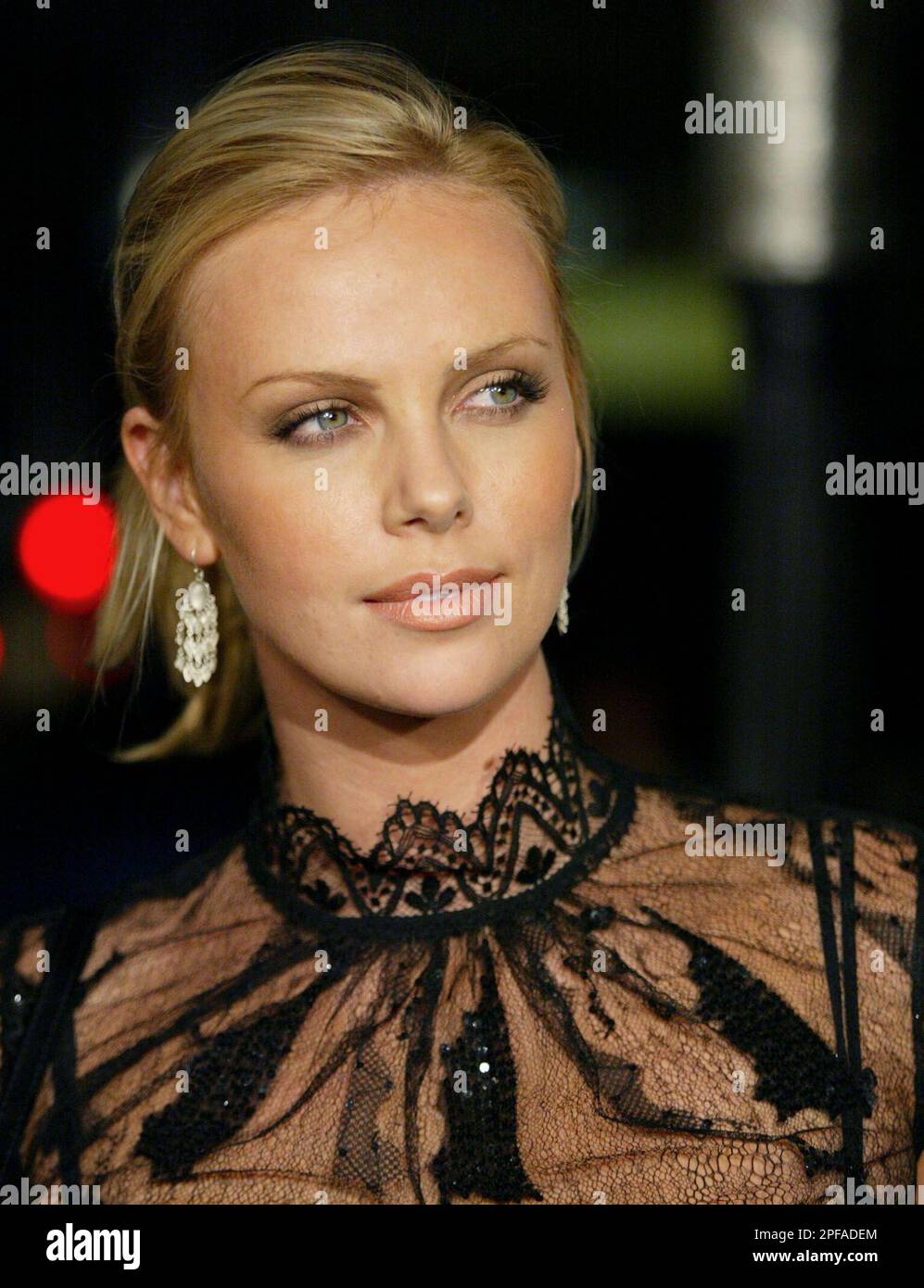 Actress Charlize Theron arrives at a screening of "The Truth About ...