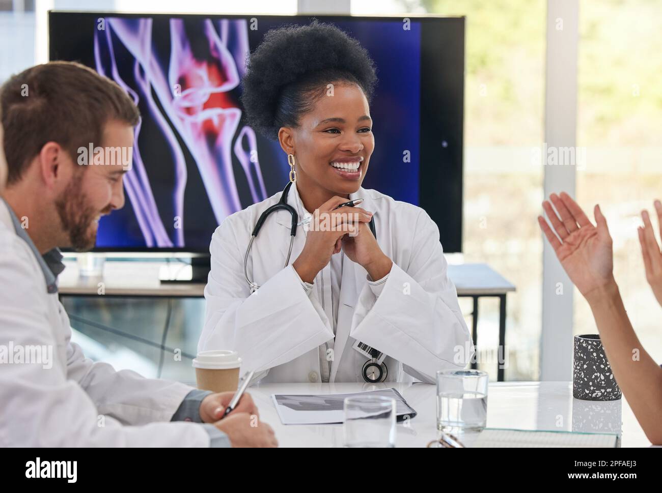 Medical meeting, black woman doctor and healthcare team with doctors ...