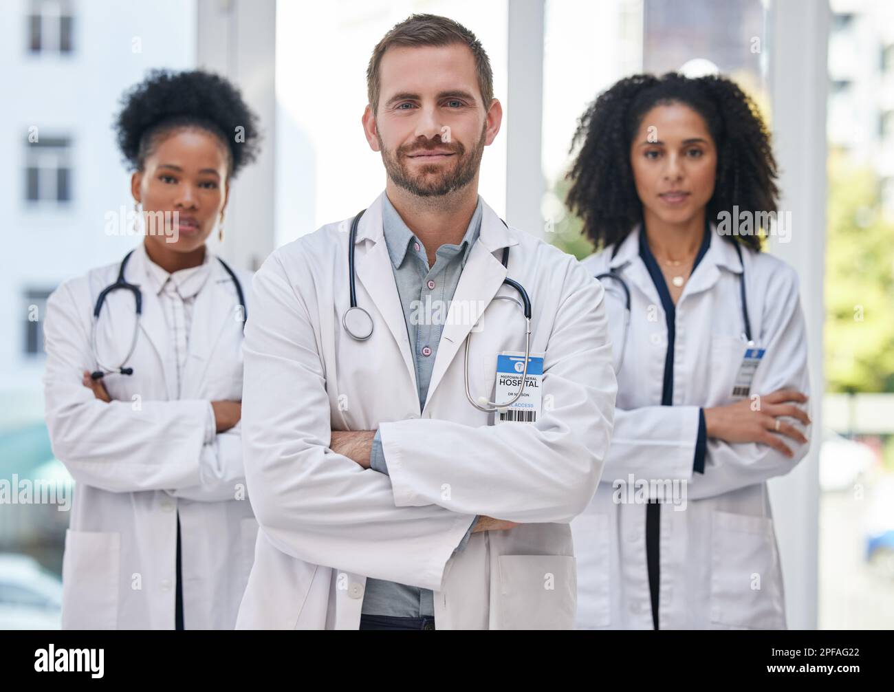 Portrait, serious and doctors at hospital proud, empowered and focus on ...