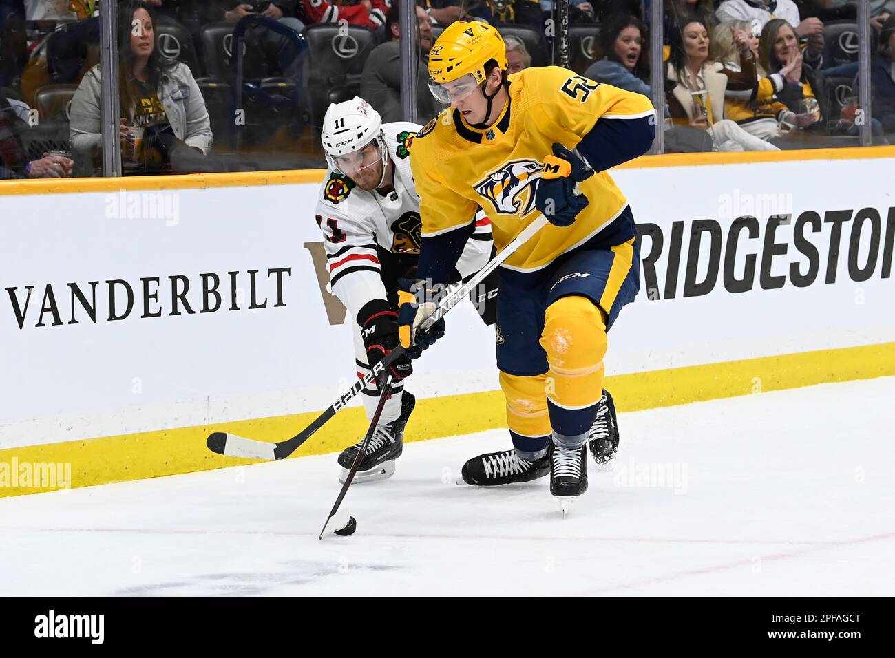 Chicago Blackhawks right wing Taylor Raddysh (11) and Nashville ...