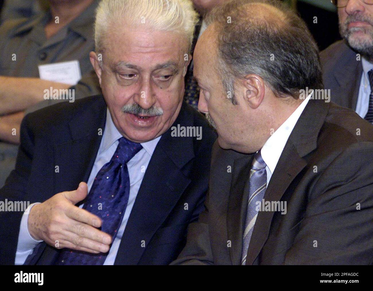 Britain lawmaker George Galloway, right and Iraqi Deputy Prime Minister ...