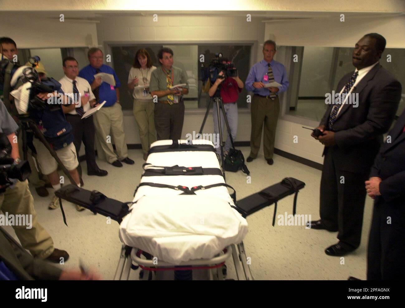Holman Correctional Facility Warden Grantt Culliver, right, talks with ...