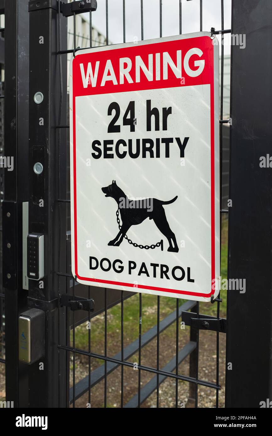 Security patrol sign with guard dog. Warning Guard Dogs On Duty Text ...