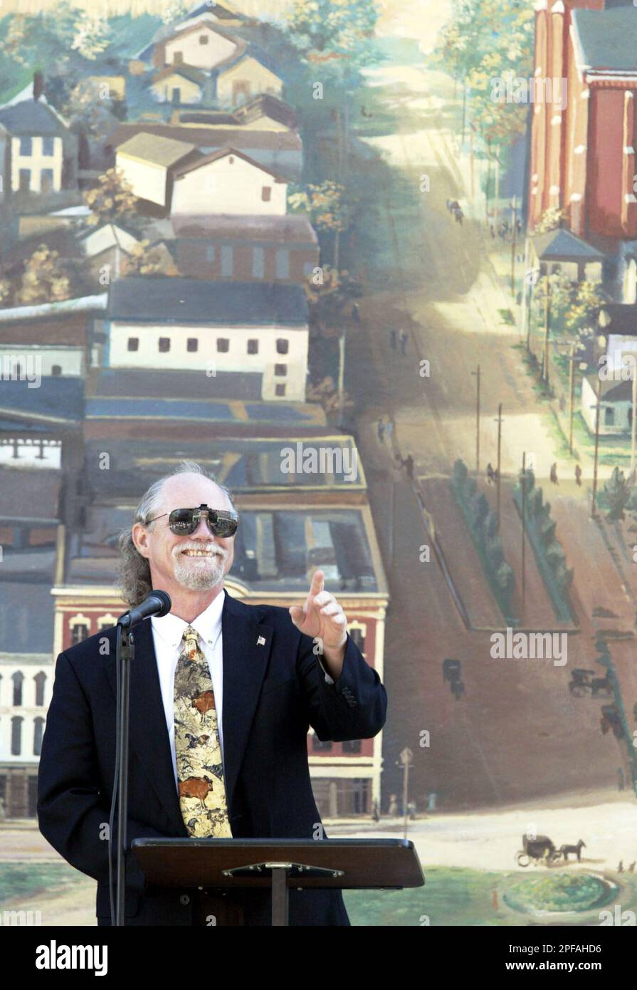 Muralist Robert Dafford of Lafayette, La., smiles and points out his ...