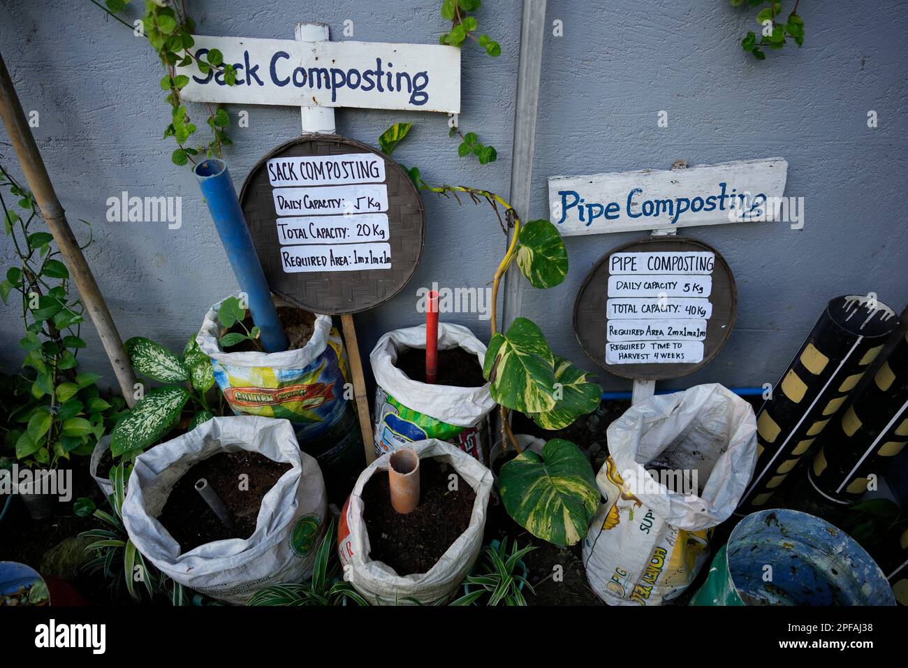 Compost is separated at a recycling facility in Malabon, Philippines on ...