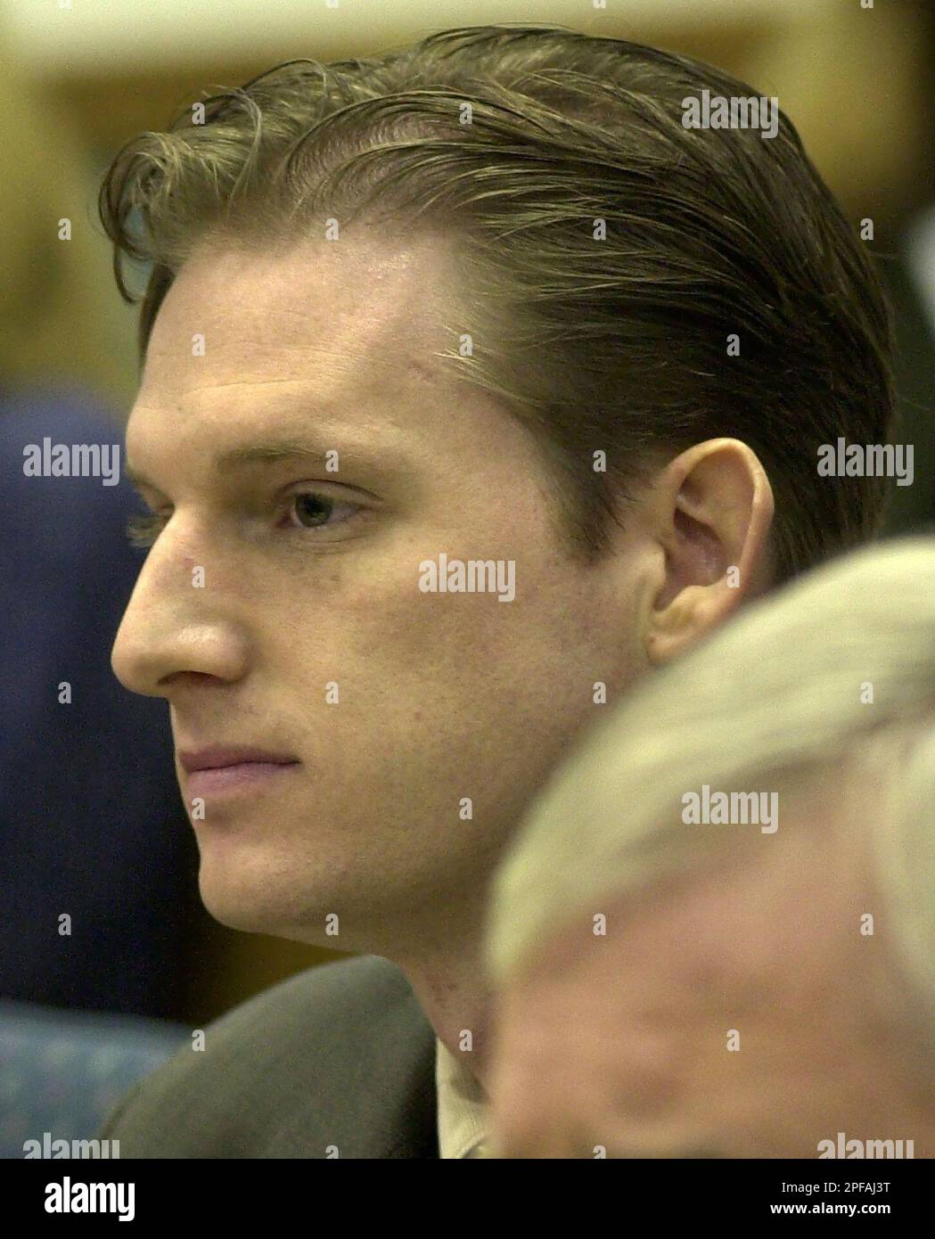 Christian Longo, charged with the aggravated murder of his wife and ...