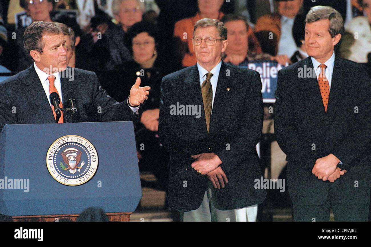 ** FILE ** Sen. Max Baucus, D-Mont., far right, joins President Bush ...