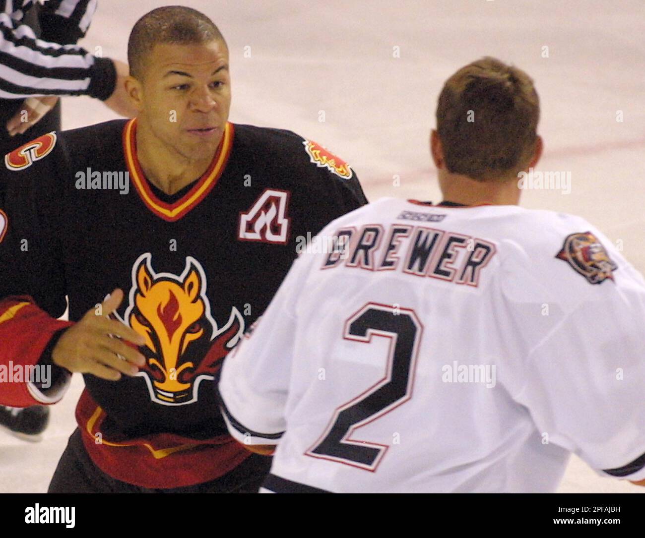 Edmonton Oilers Eric Brewer, right, and Calgary Flames Jarome Iginla ...