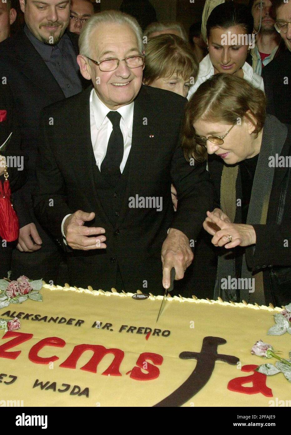 Oscar winning Polish film director Andrzej Wajda cuts a cake at the ...