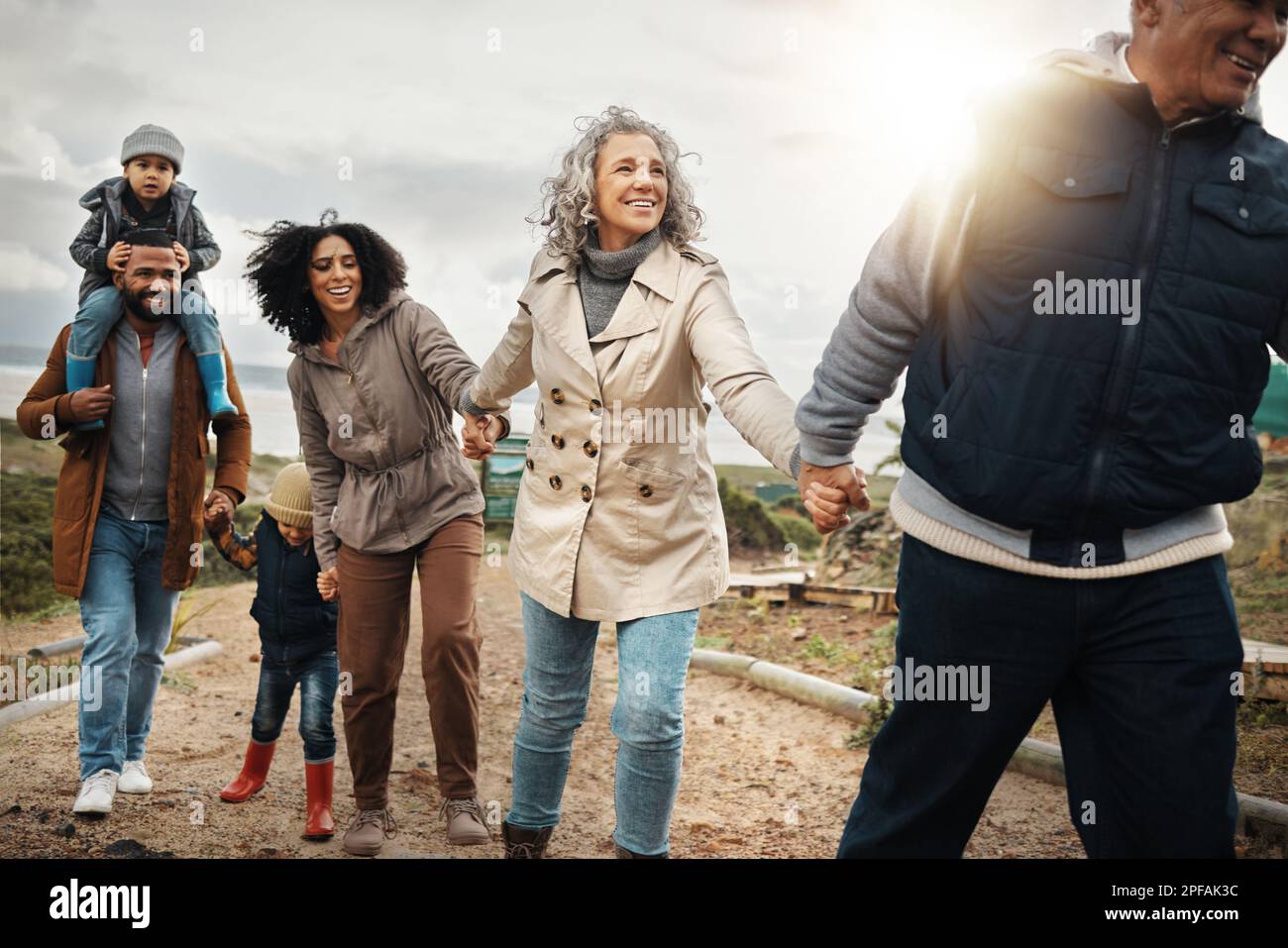 Family, travel and adventure outdoor holding hands with children ...