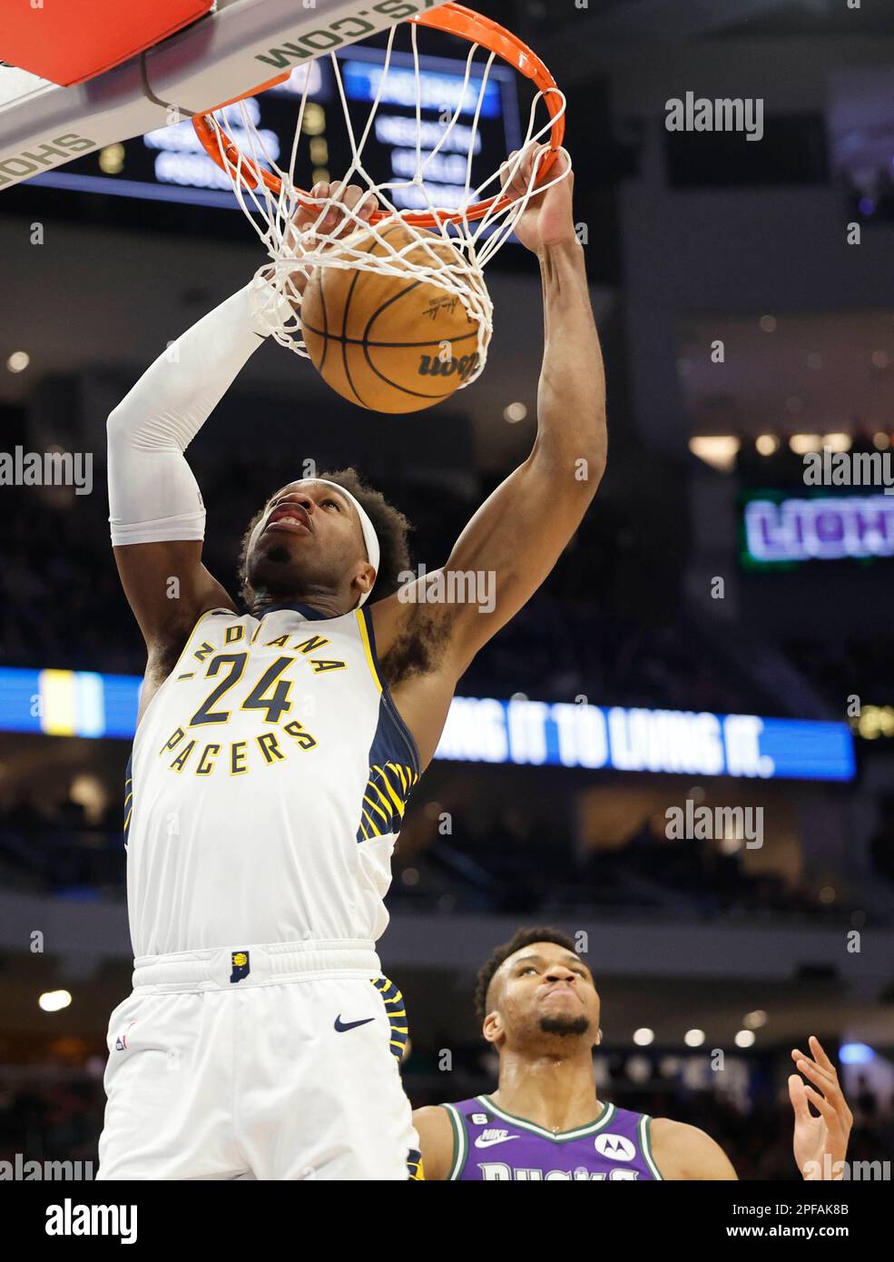 Indiana Pacers guard Buddy Hield (24) dunks in front of Milwaukee Bucks ...