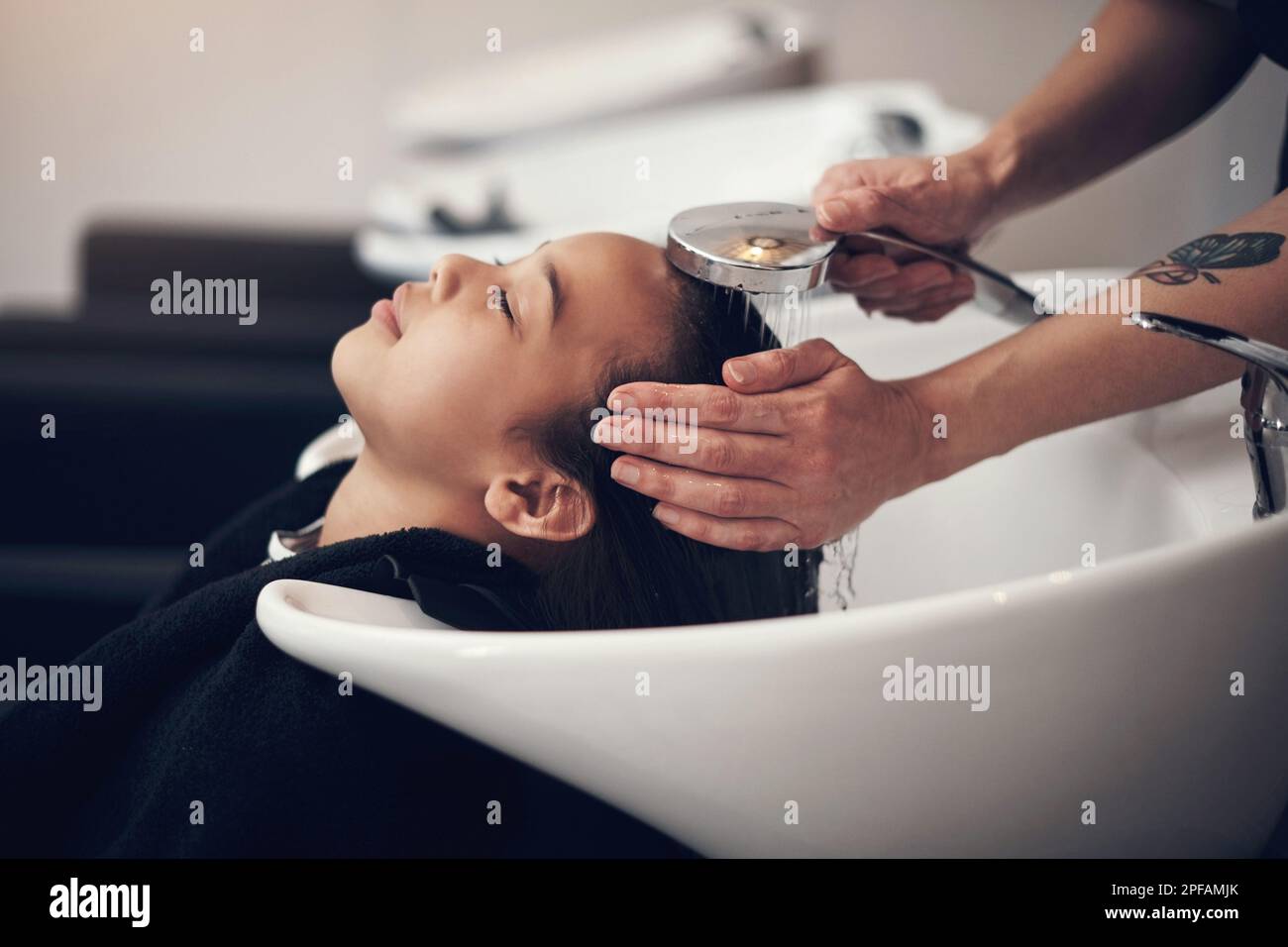 My favourite part about coming here is the hair washing sesh. a young ...