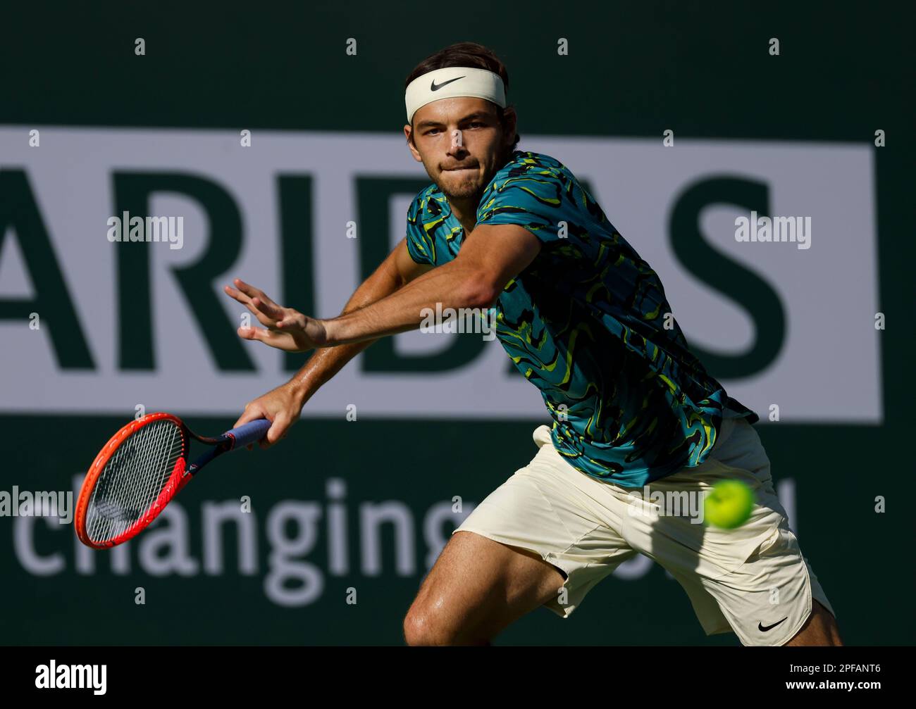 March 16, 2023 Taylor Fritz returns a shot against Jannik Sinner of Italy during the 2023 BNP ...